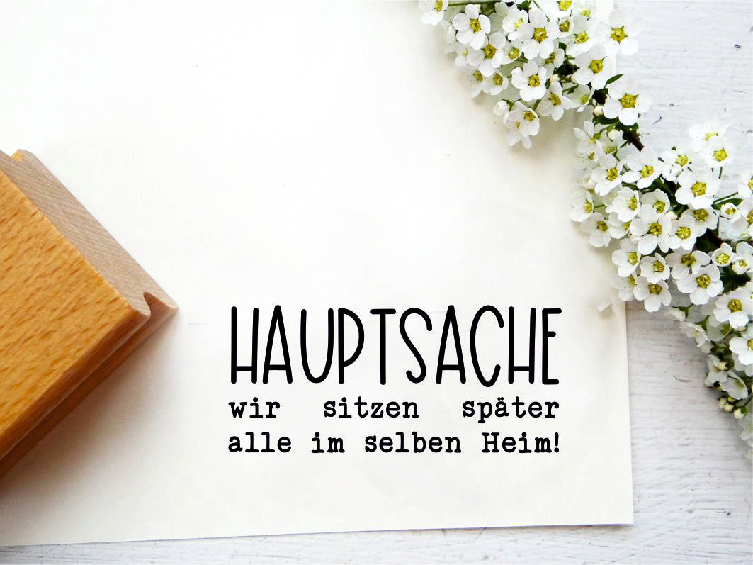 Stempeltext"Hauptsache wir sitzen später im selben Heim" – Schlüssel&Wort